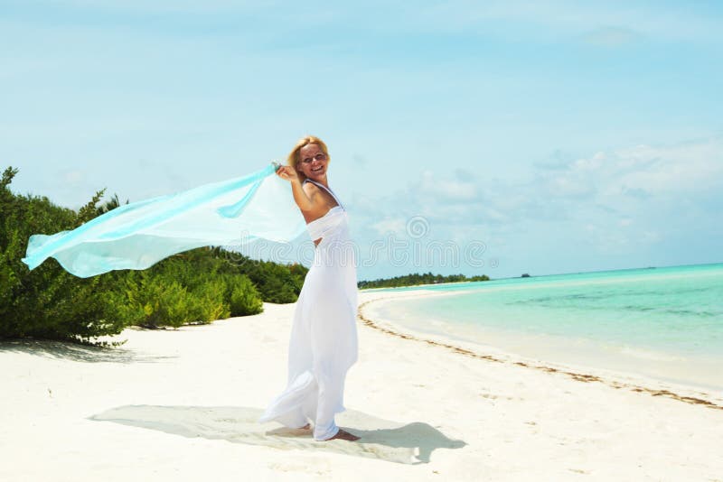 289 Woman Beach Wind Blowing Fabric Stock Photos - Free & Royalty-Free ...
