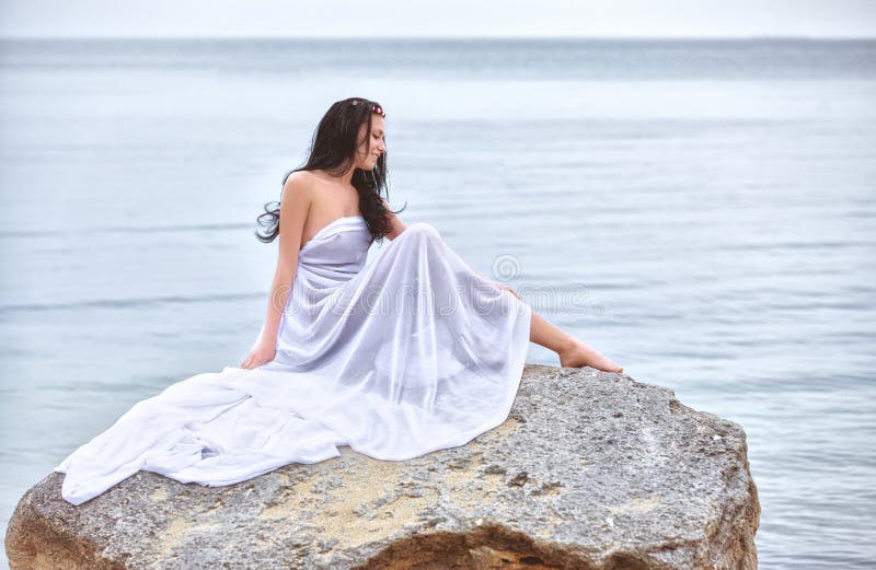 Woman in White Fabric on the Rock Stock Image - Image of erotic ...