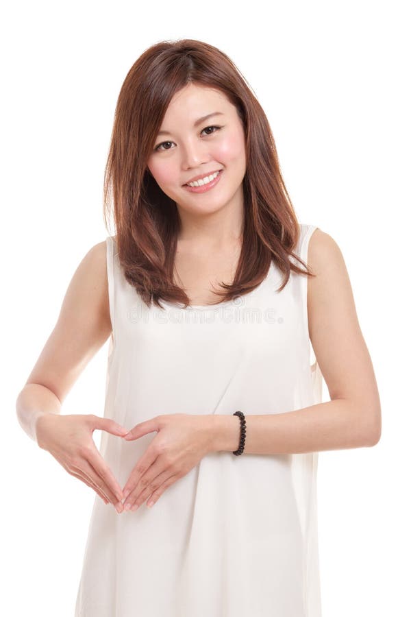 Woman in White with Hands in Shape of a Heart Stock Image - Image of ...