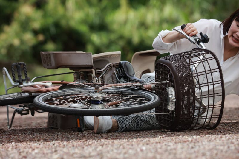 A Woman Who Falls on a Bicycle Stock Photo - Image of landscape, fall ...
