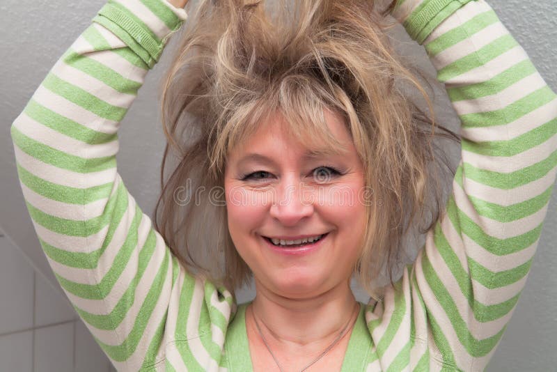 Woman with wild hair stock photo. Image of maturity, details - 21960884