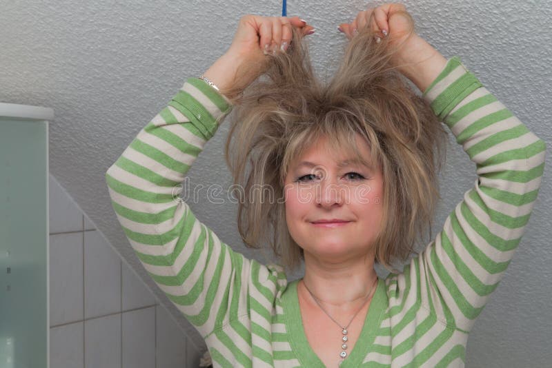 Woman with wild hair stock photo. Image of maturity, details - 21960884