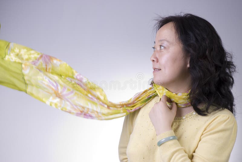 Woman with wind up scarf stock photo. Image of blowing - 7857002