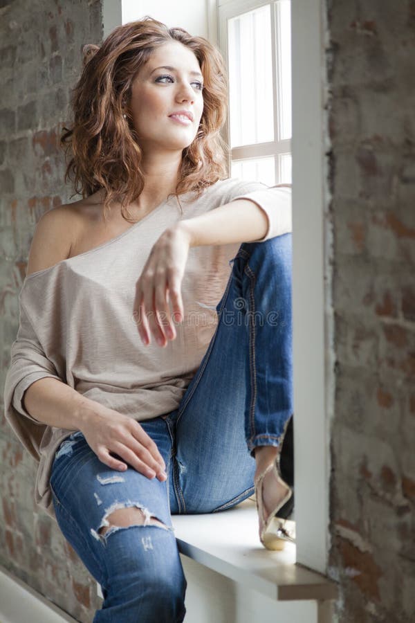 Woman by the window stock photo. Image of casual, interior - 27985436