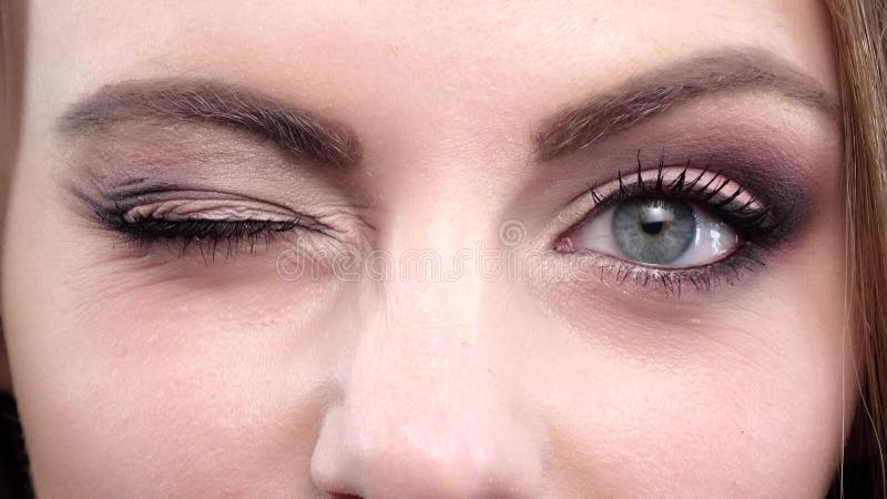 Woman Winking. Blue Eyes. Closeup Stock Video - Video of beauty ...