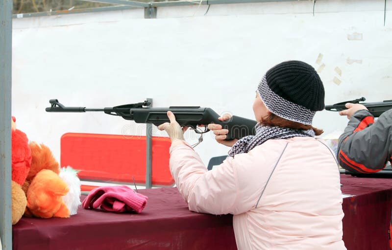 Woman with a rifle stock photo. Image of range, beautiful - 144281098