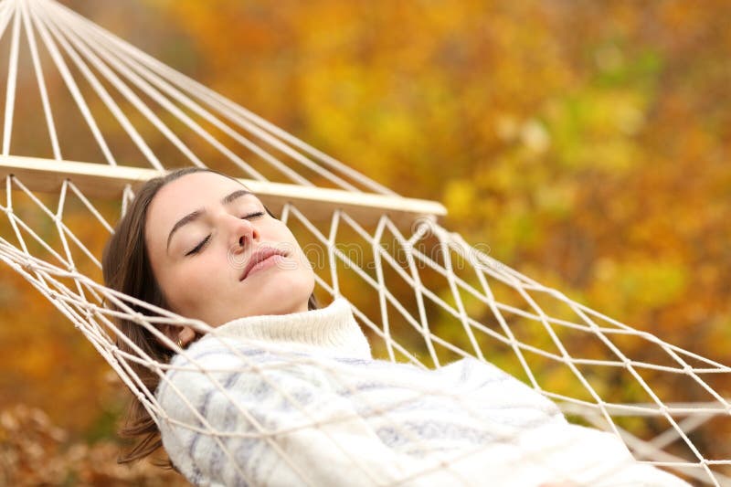 Woman in Winter Sleeping on Hammock in Natue Stock Photo - Image of ...
