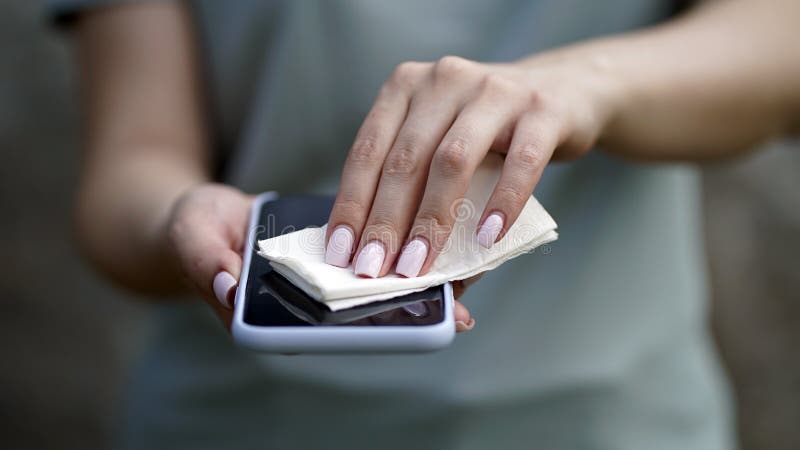 Woman Wiping Mobile Phone with a Napkin Stock Image - Image of care ...