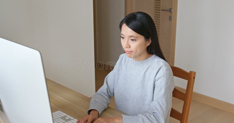 Woman work on computer stock photo. Image of black, notebook - 141961752
