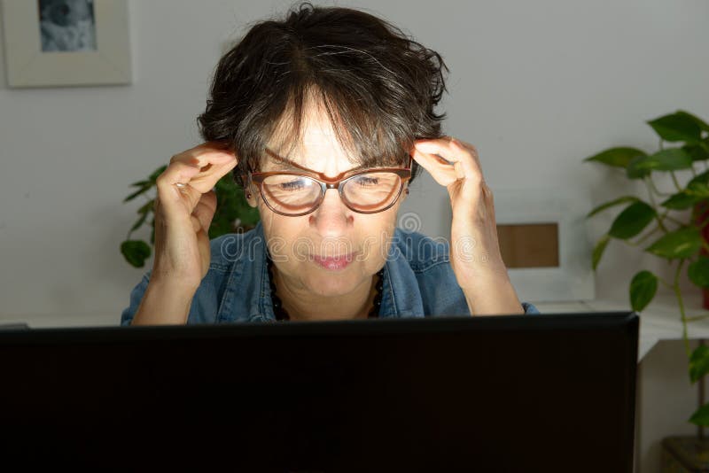 Woman at Work with Computer Suffering Painful Headache Stock Photo ...