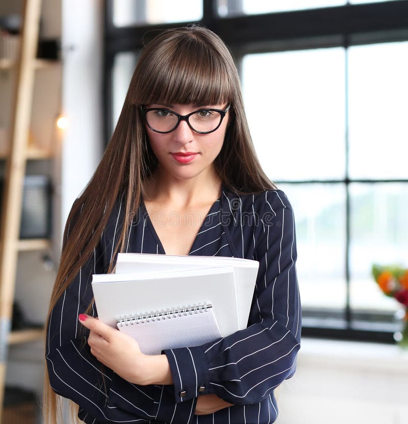 Woman at work stock image. Image of holding, hairstyle - 60388593