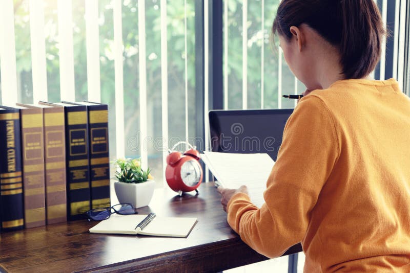 Woman Work at Home with Her Computer and Book Stock Photo - Image of ...
