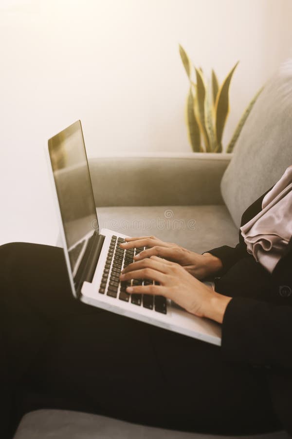 Woman Work at the Notebook Sit on Sofa at Home Concept for Alternative ...