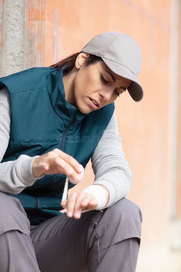 Woman Worker Bandaging Injured Hand Stock Photo - Image of architect ...