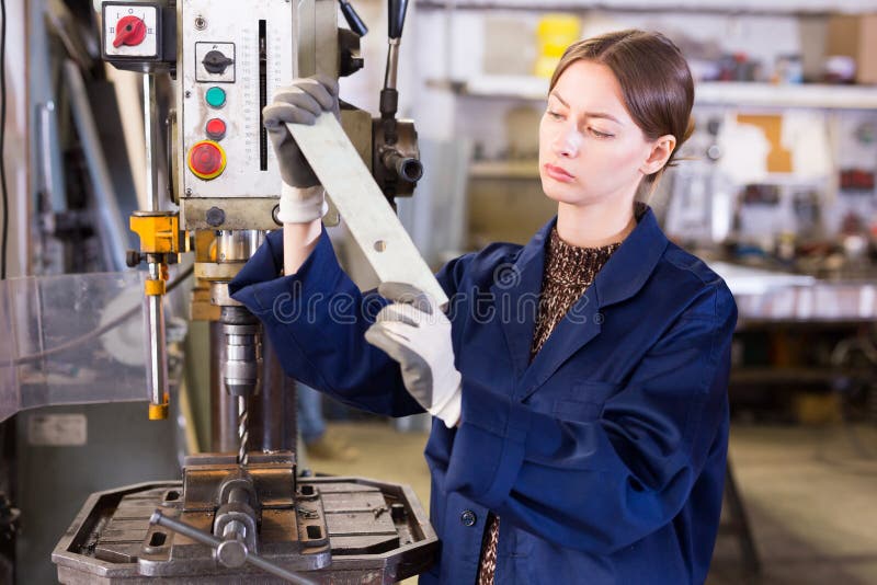 Woman Worker in Uniform Working with Metal Beams Stock Photo - Image of ...