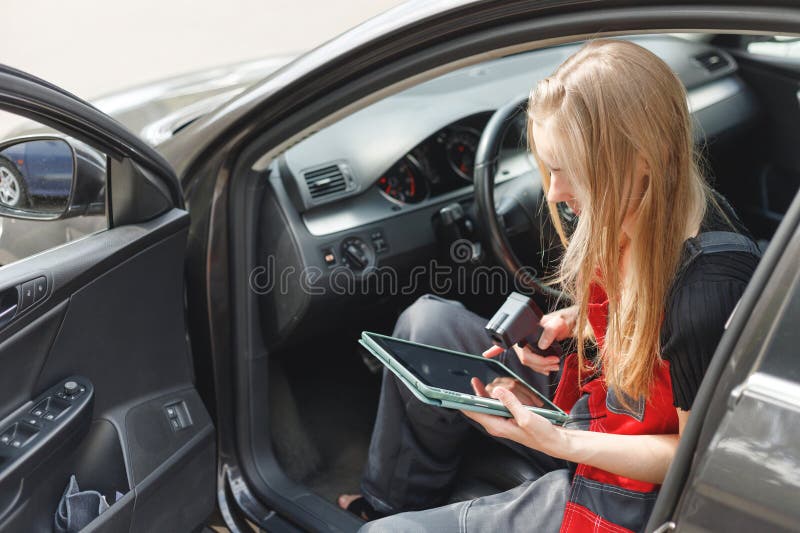 Woman Worker Using Digital Tablet with Empty Screen Sitting in Car ...
