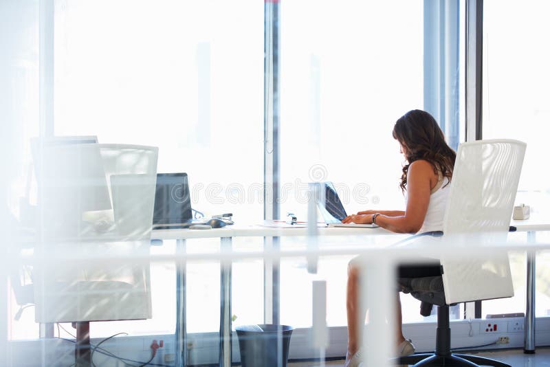 Woman Working Alone in an Office Stock Photo - Image of white ...