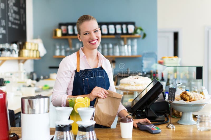 Woman working at cafe stock image. Image of holding, drink - 60109157