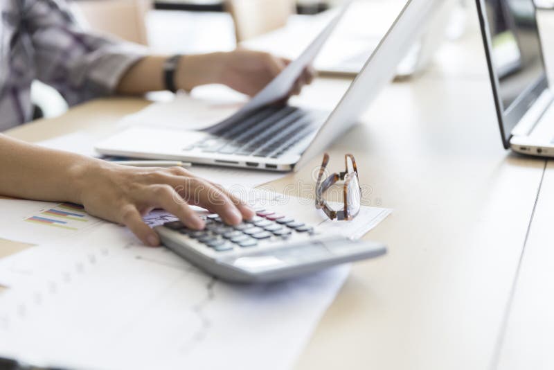 Woman Working with Calculator, Business Document and Computer No Stock ...