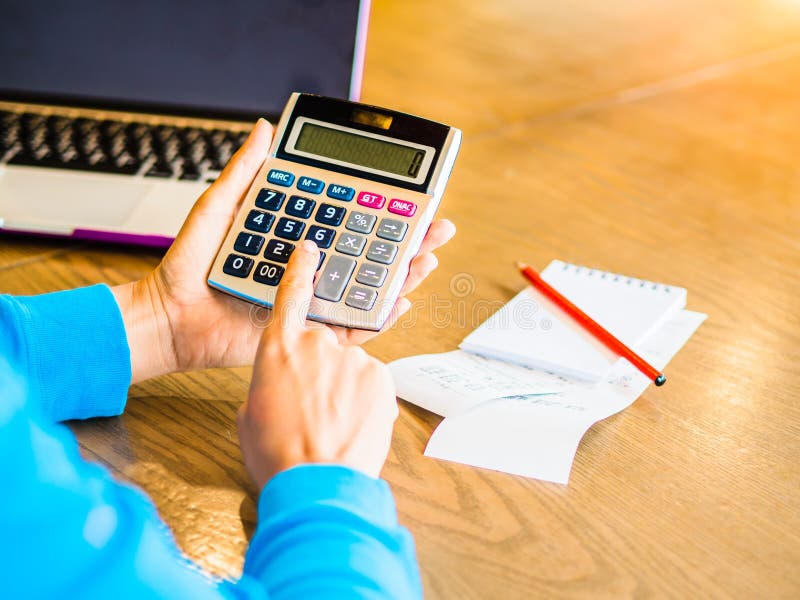 Woman Working with Calculator Stock Photo - Image of notebook ...