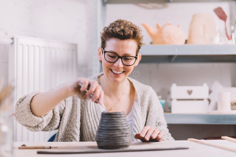 Woman Working with Clay in Pottery Ceramics Workshop Stock Photo ...