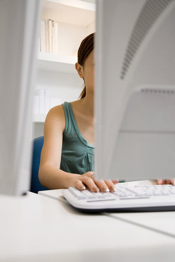 Woman working on computer stock photo. Image of assistant - 62808124