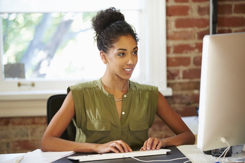 Woman Working at Computer in Contemporary Office Stock Photo - Image of ...