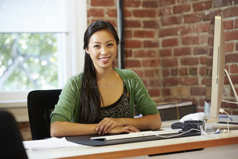 Woman Working at Computer in Contemporary Office Stock Image - Image of ...