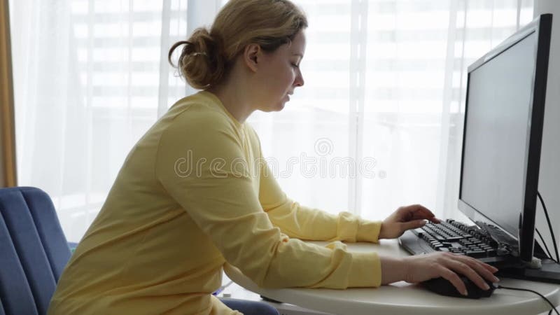 Woman Working on Computer at Desk, Typing on Keyboard, Remote Work ...