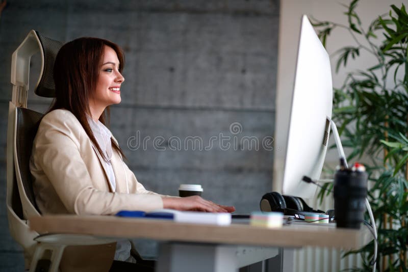 Woman Working at Computer in Modern Office Stock Image - Image of ...