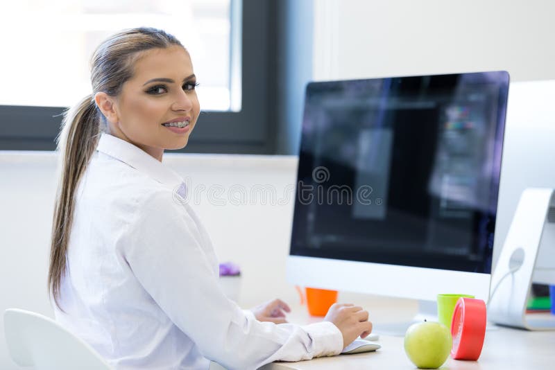 Woman Working at Computer in an Office Stock Photo - Image of caucasian ...