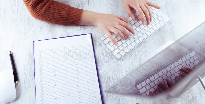 Woman Working in Document with Computer on Desk. Stock Image - Image of ...