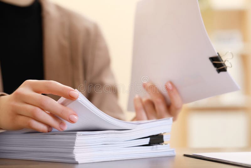Woman Working with Documents at Table in Office, Closeup Stock Image ...