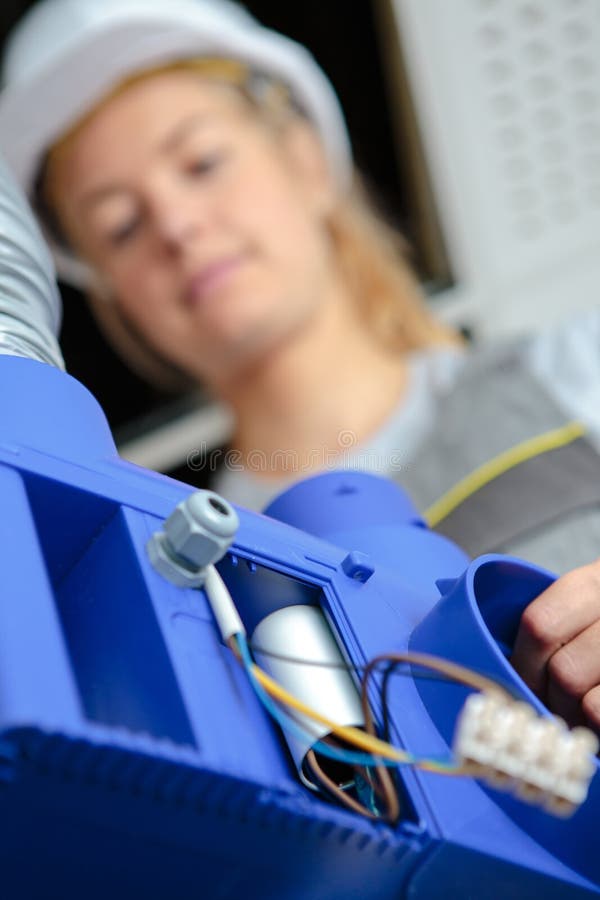 Woman Working on Electrical Machine Stock Photo - Image of manual ...