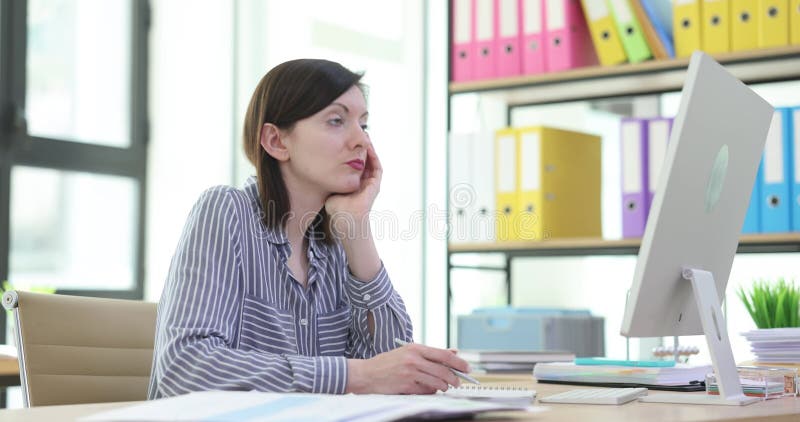 Woman Working Hard at Desk Thinking and Writing Ideas in Office Stock ...