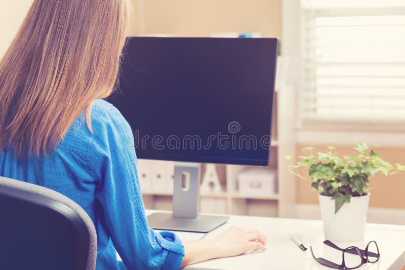 Woman Working on Her Computer in Her Home Office Stock Photo - Image of ...