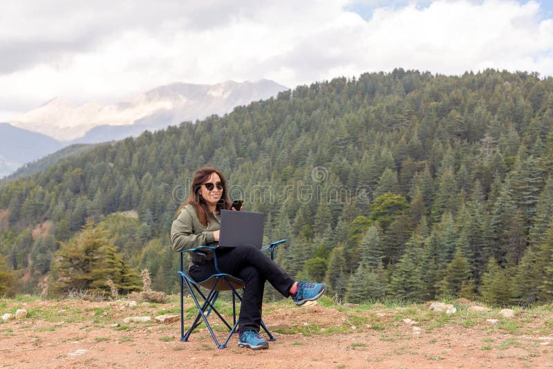 Woman Working with Her Computer in Nature, Working with a Computer in ...