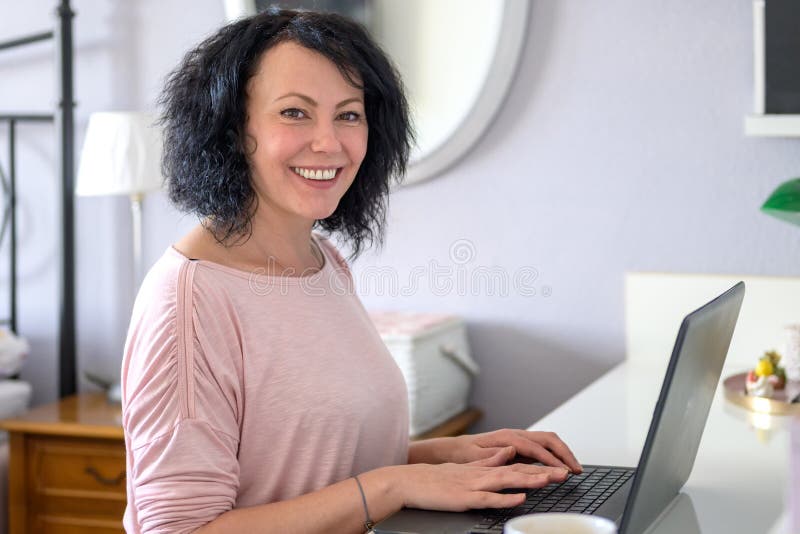 Woman is Working on Her Computer Stock Photo - Image of working ...