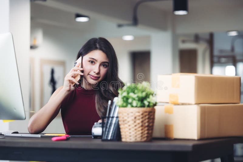 Woman Working at Home with Laptop and Mobile Phone Stock Image - Image ...