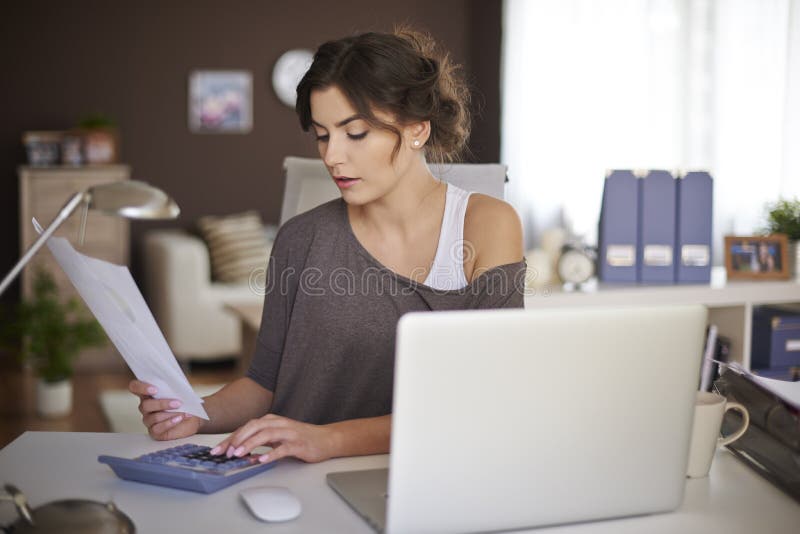 Woman working at home stock photo. Image of chair, house - 51673858