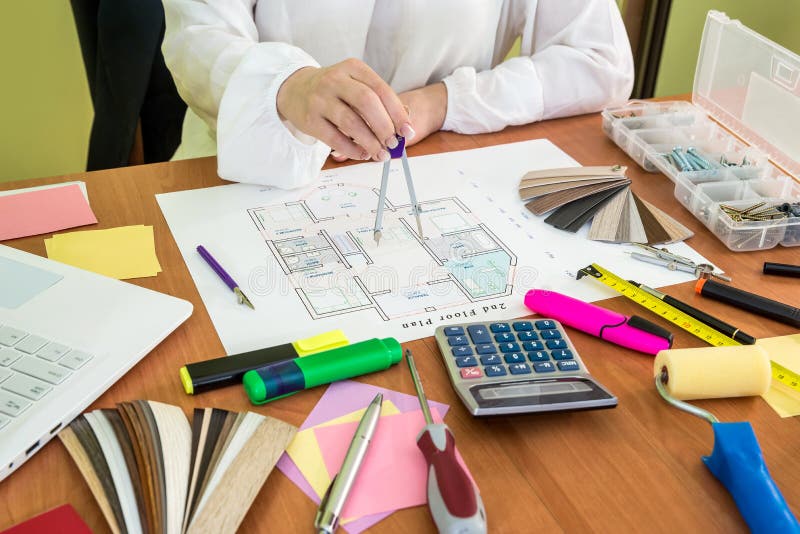 Woman Working at House Development with Different Tools. Stock Photo ...