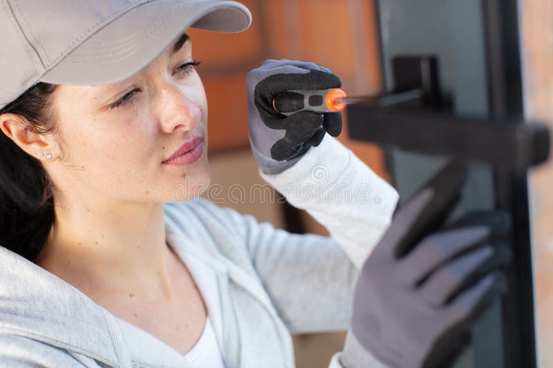 Woman Working Indoors Using Screwdriver Stock Photo - Image of adult ...