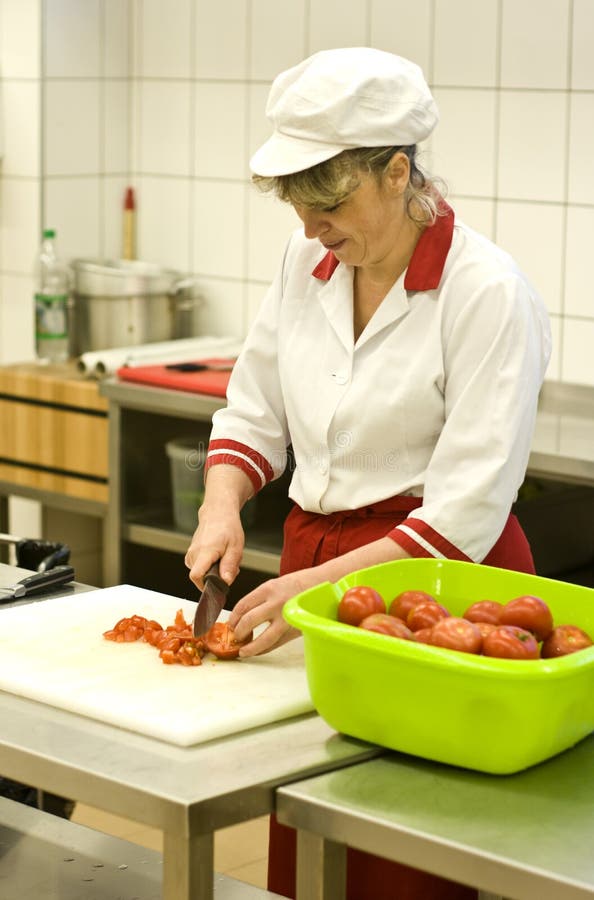 Woman working in kitchen stock image. Image of culinary - 6987245