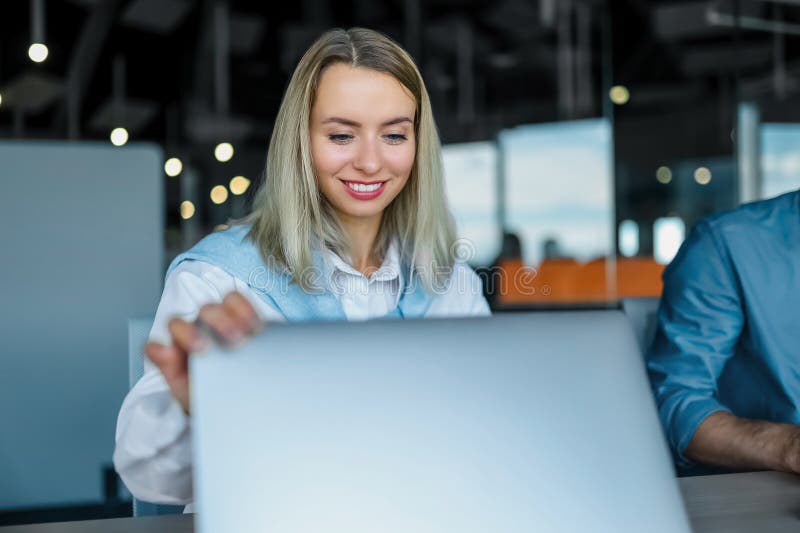 Woman working on a laptop stock image. Image of finance - 274870401