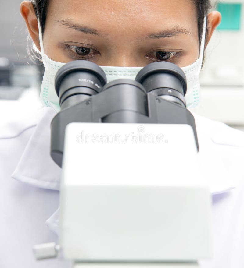 Woman Working with a Microscope Stock Photo - Image of medical, looking ...