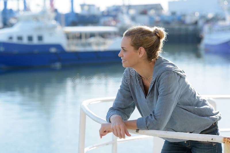 Woman Working on Motorboats Stock Photo - Image of dock, person: 148582460