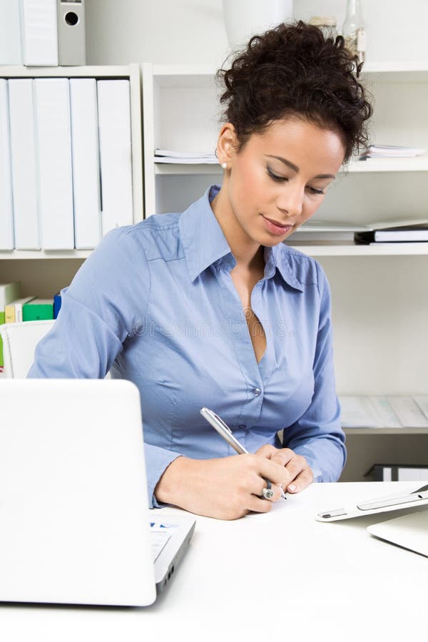 Woman working in office stock image. Image of outfit - 35735539