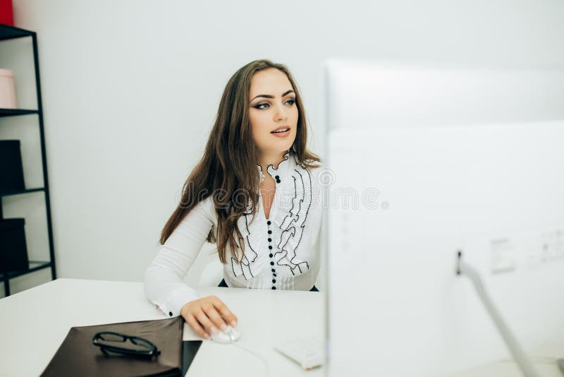 Woman Working in Office, Sitting at Desk, Using Computer Stock Image ...