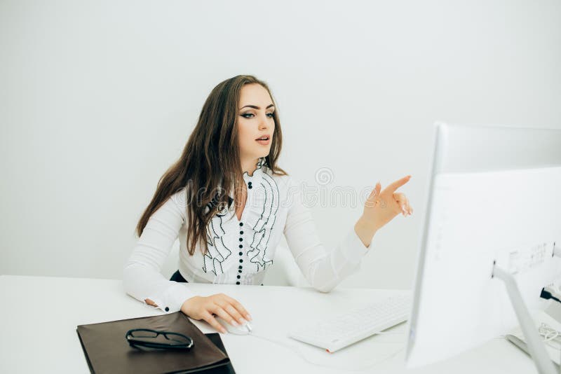 Woman Working in Office, Sitting at Desk, Using Computer Stock Photo ...