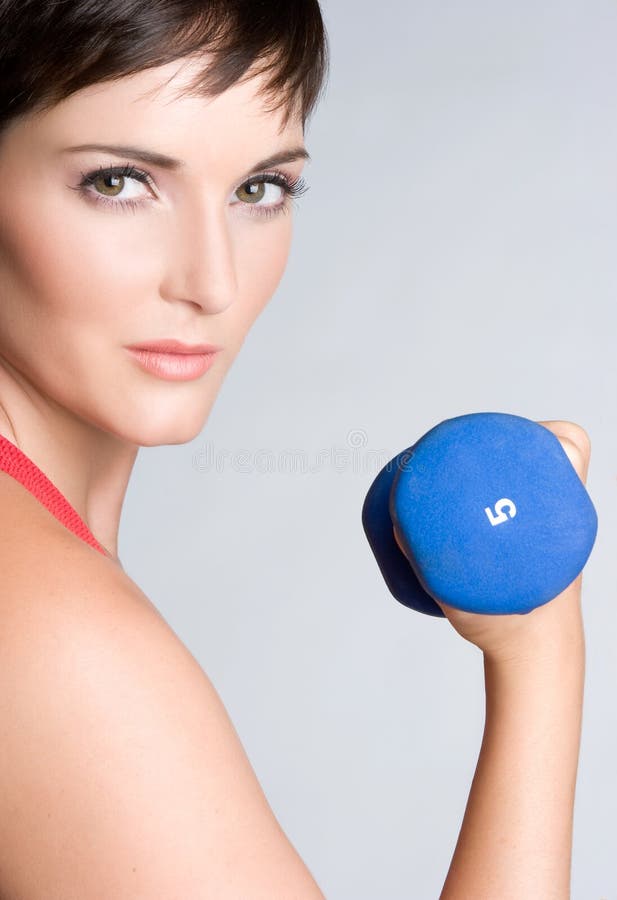 Woman Working Out stock photo. Image of girls, dumbells - 12077076
